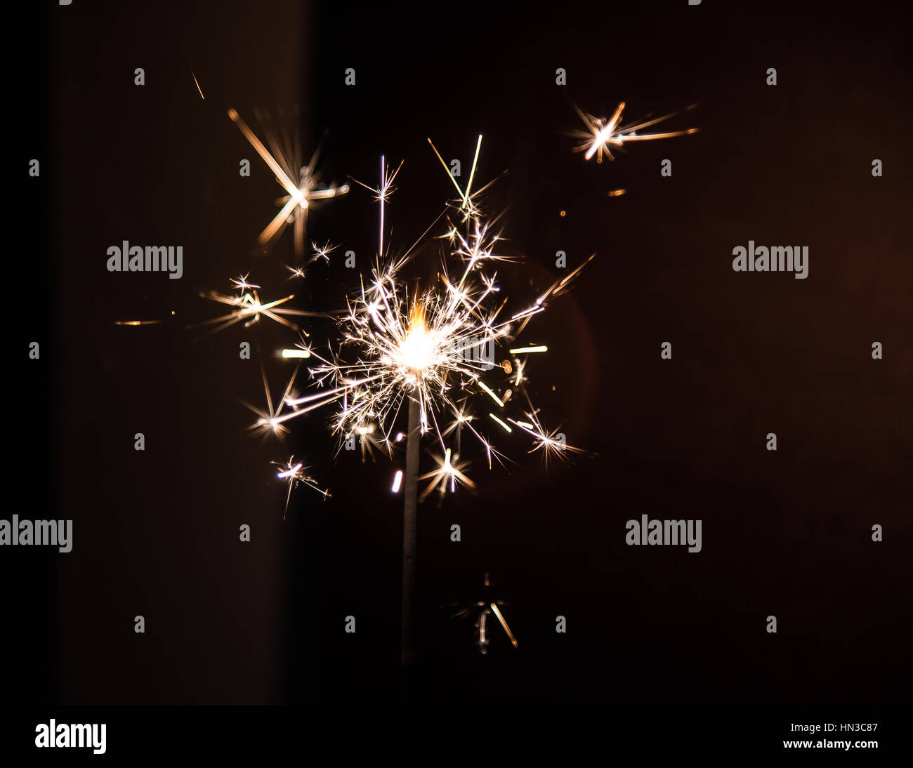Lit sparkler macro close up Stock Photo - Alamy