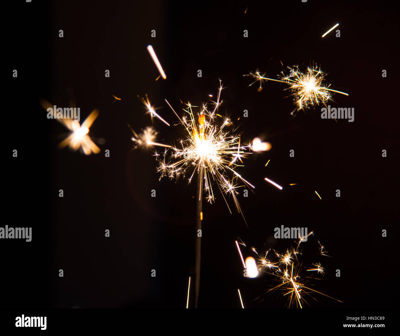 Lit sparkler macro close up Stock Photo - Alamy
