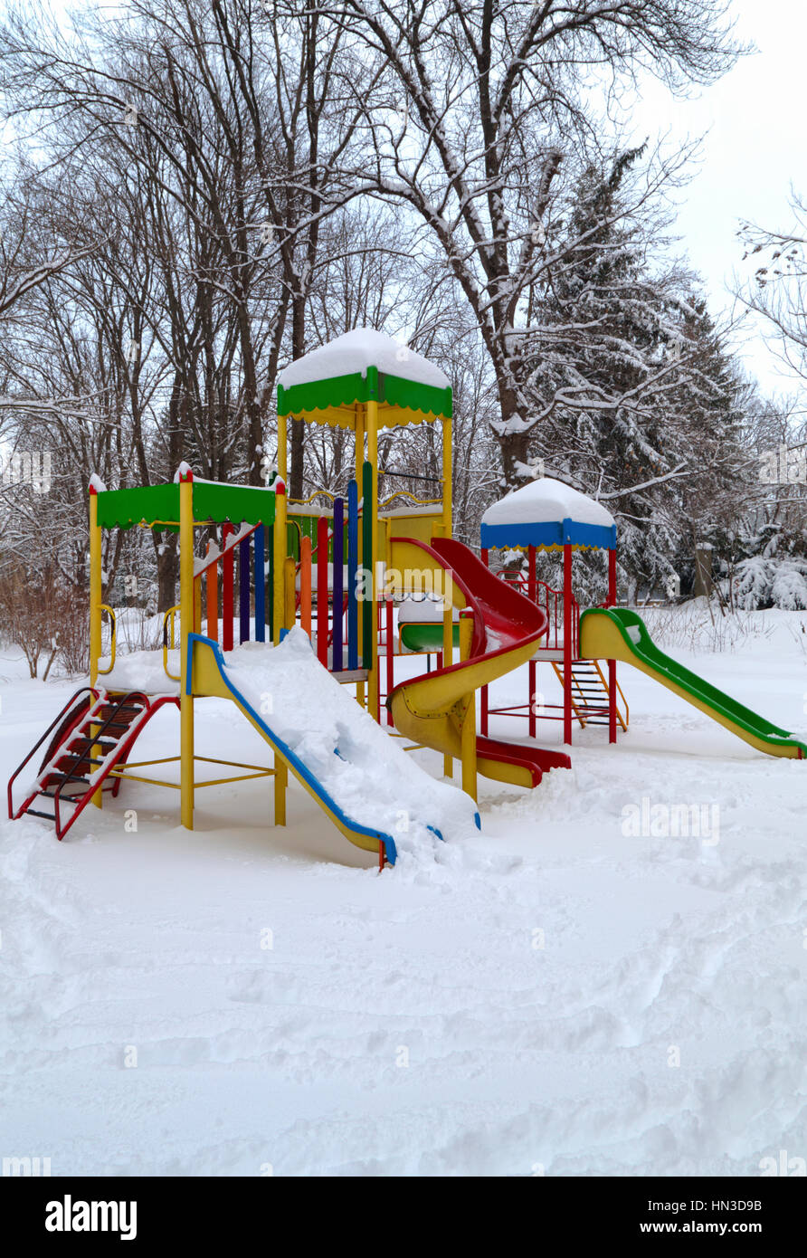 Children's playground covered with snow in winter Stock Photo - Alamy