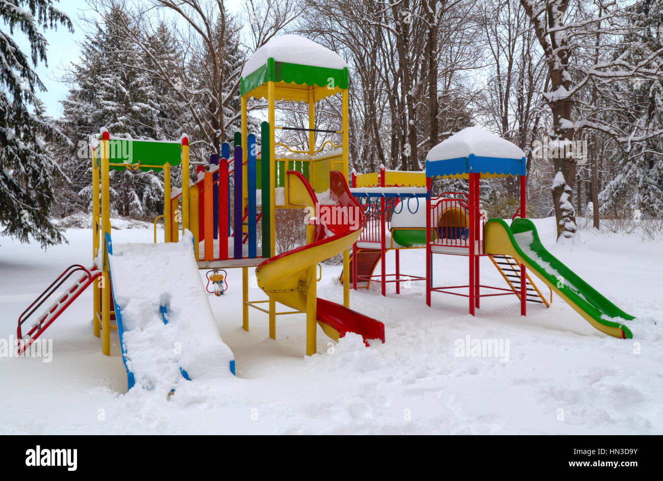 Children's playground covered with snow in winter Stock Photo - Alamy