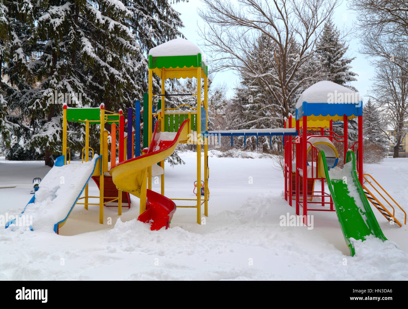 Children's playground covered with snow in winter Stock Photo - Alamy