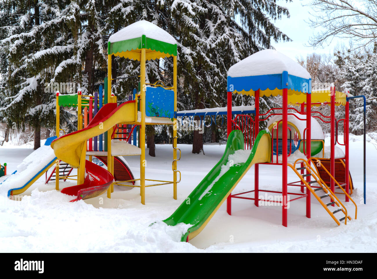 Children's playground covered with snow in winter Stock Photo - Alamy