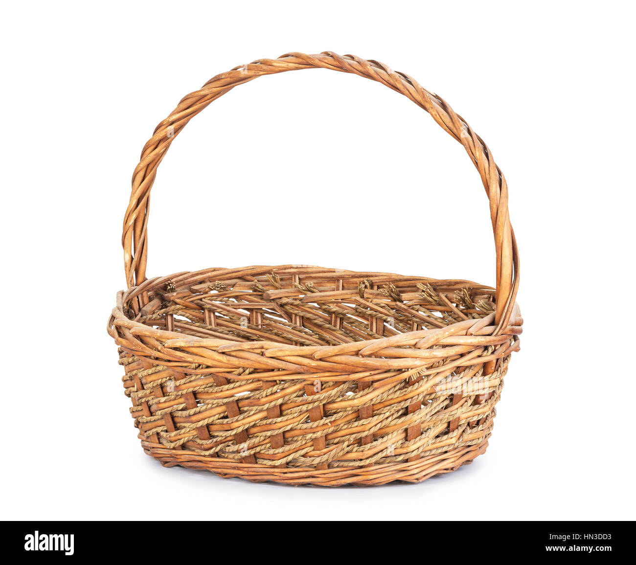 Brown wicker basket on white background Stock Photo - Alamy