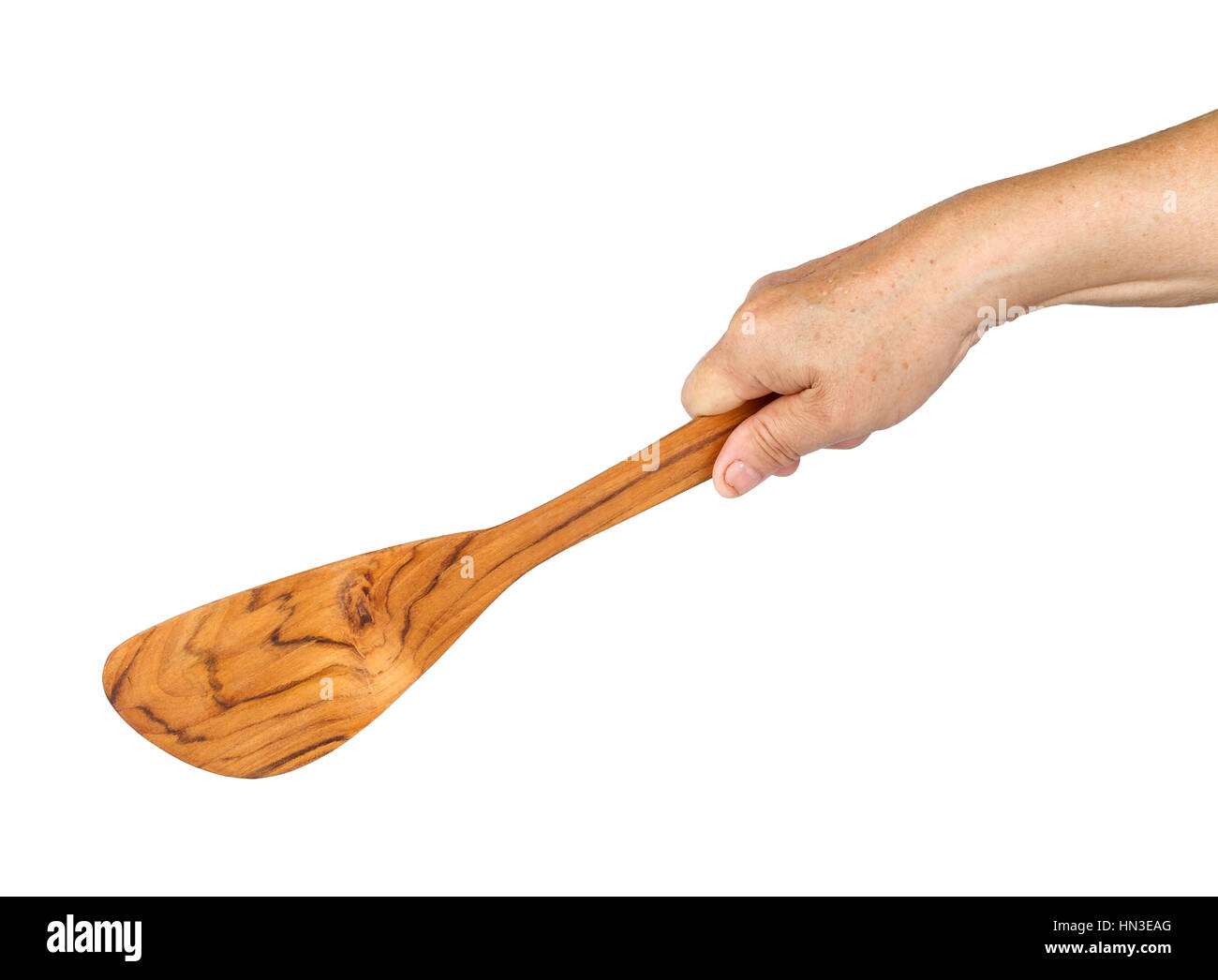 long-handle ladle made from teak in hand isolated on white background ...