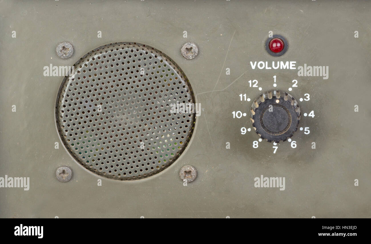 old style dial volume switch with speaker and red light indicator Stock ...