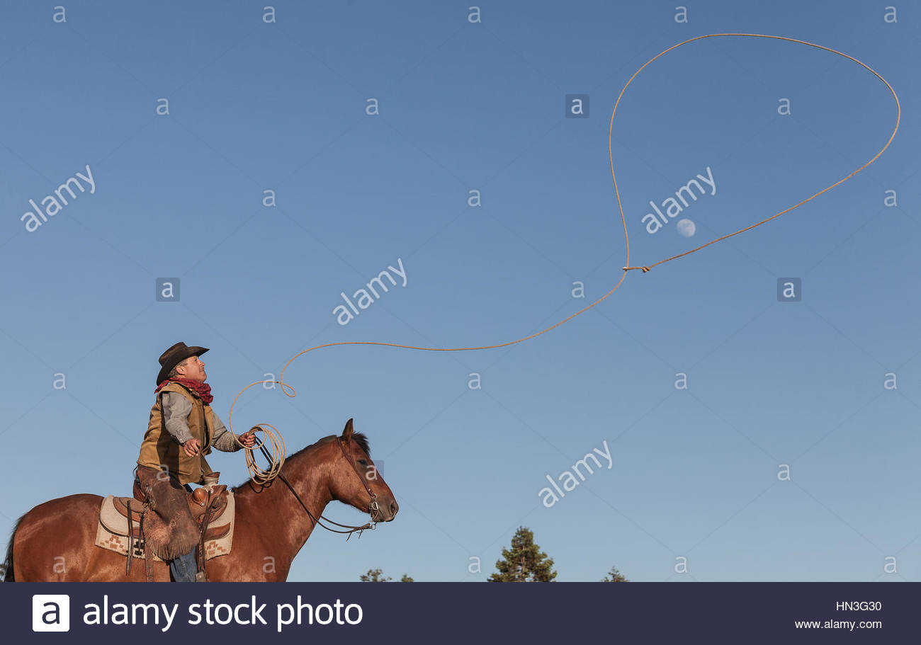 Three Cowboys On Horseback Stock Photos & Three Cowboys On Horseback ...