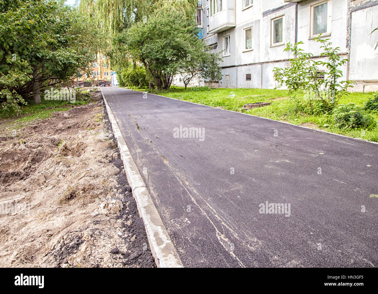 pavement covered with new asphalt outdoor on summer day Stock Photo - Alamy