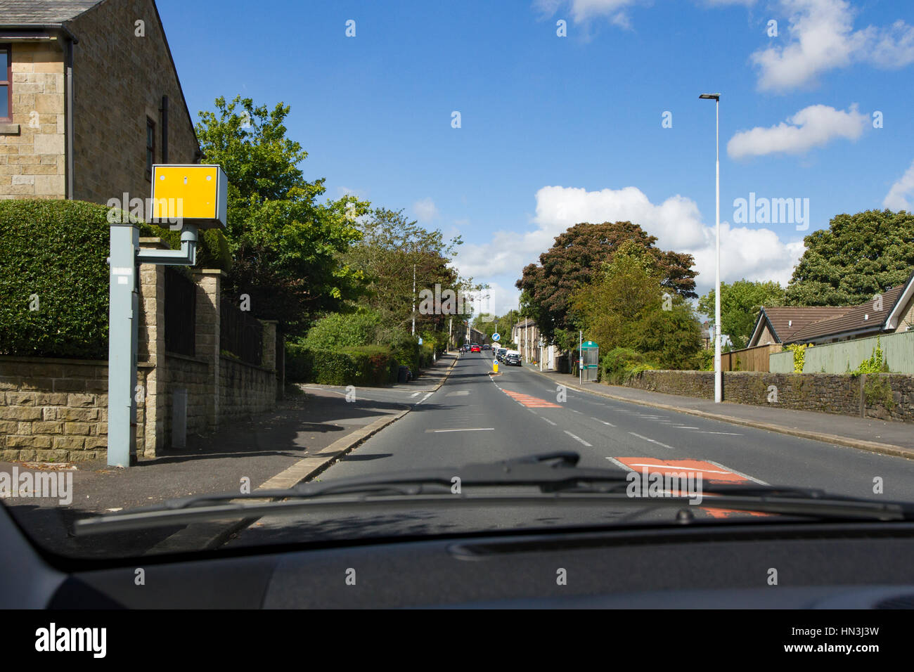 View through windscreen of car approaching speed camera Stock Photo - Alamy