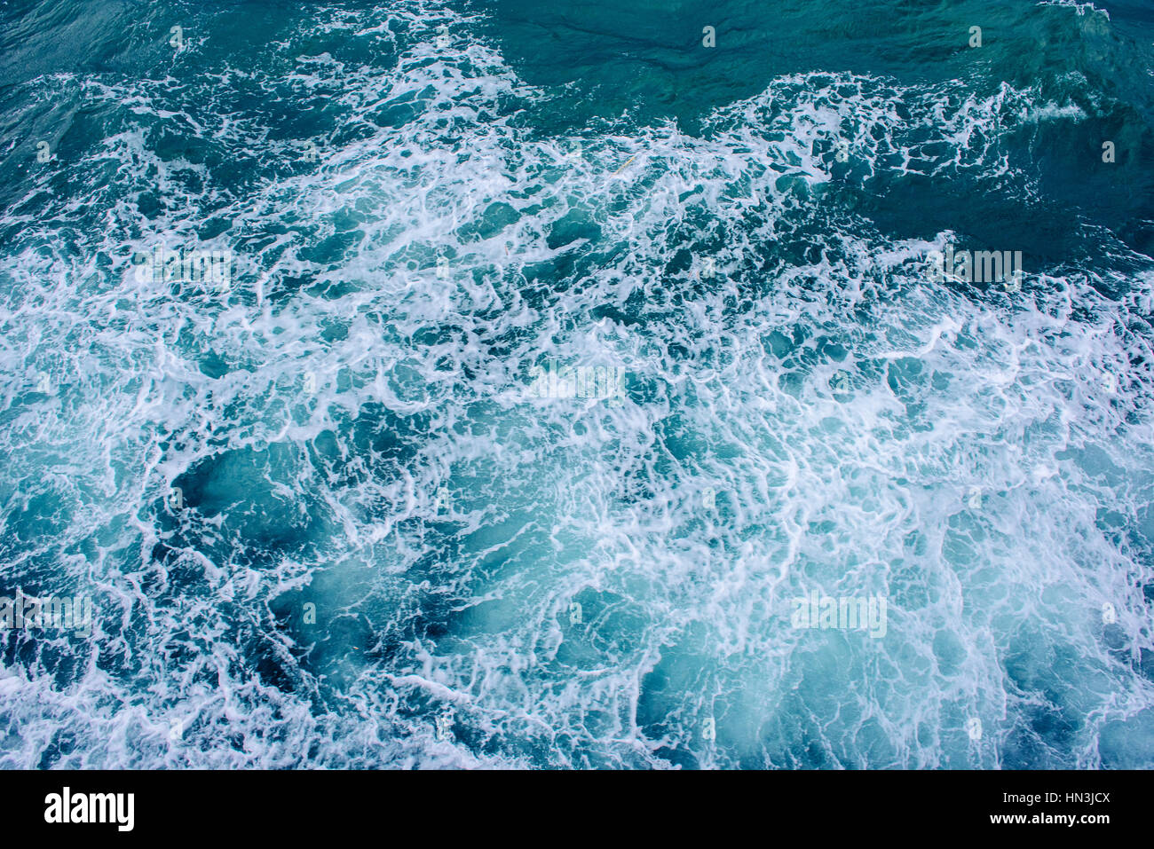 Background blue waves of the sea Stock Photo - Alamy