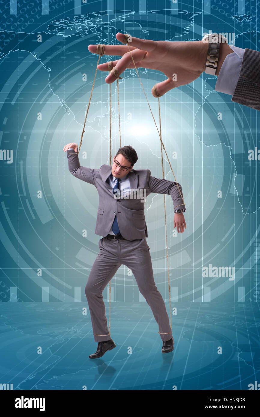 Businessman puppet being manipulated by boss Stock Photo - Alamy
