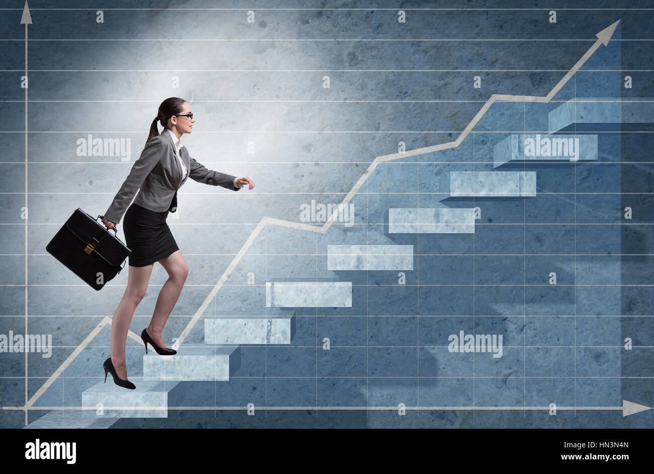 Young businesswoman climbing career ladder Stock Photo - Alamy