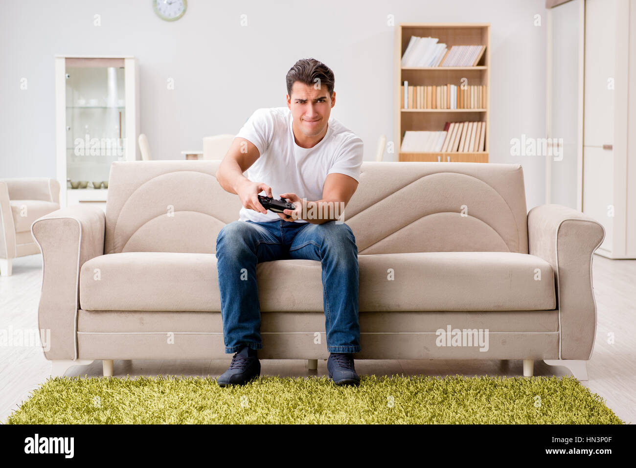 Man addicted to computer games Stock Photo - Alamy