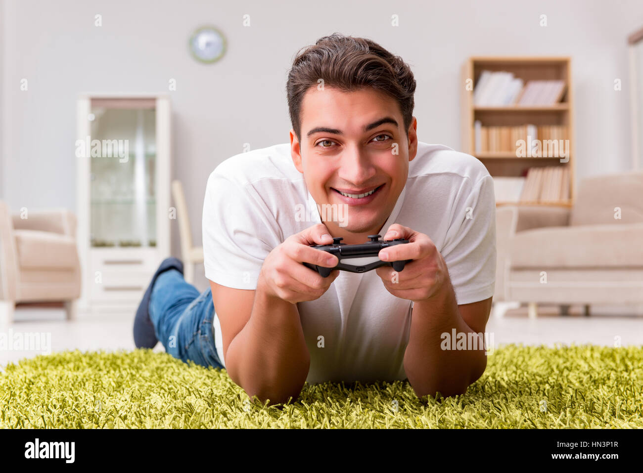 Man addicted to computer games Stock Photo - Alamy