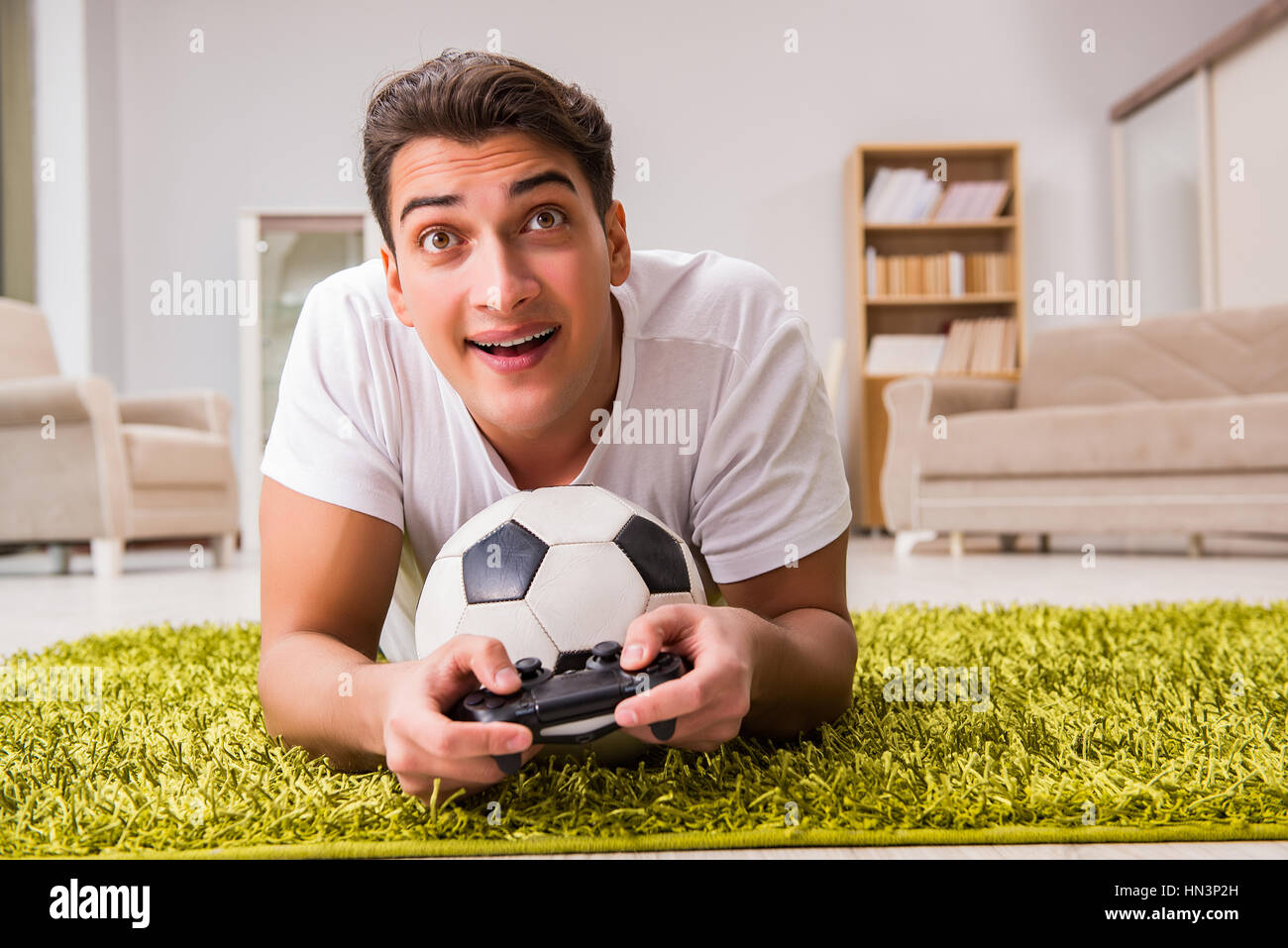 Man addicted to computer games Stock Photo - Alamy