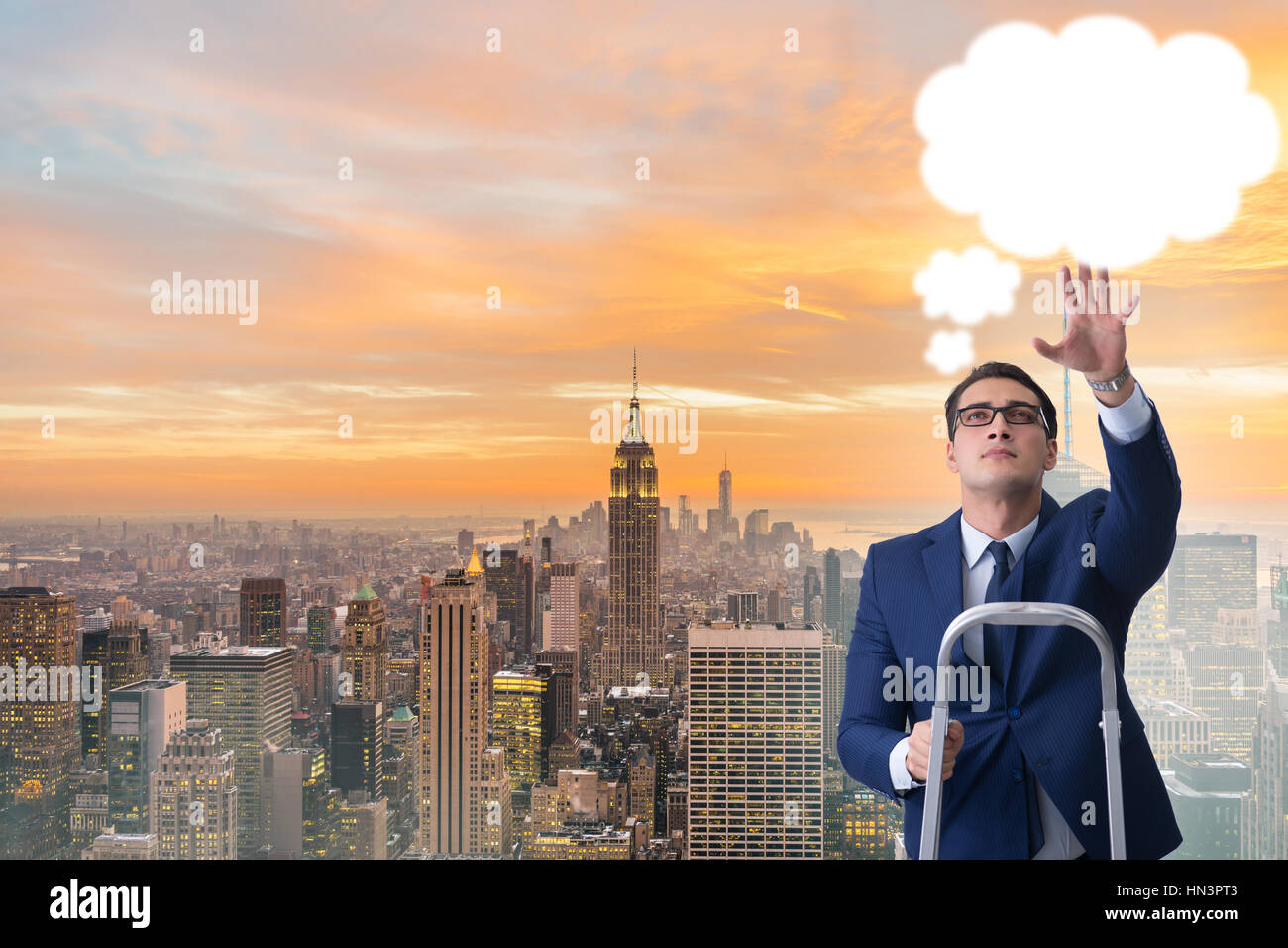 Businessman reaching out to callout message Stock Photo - Alamy
