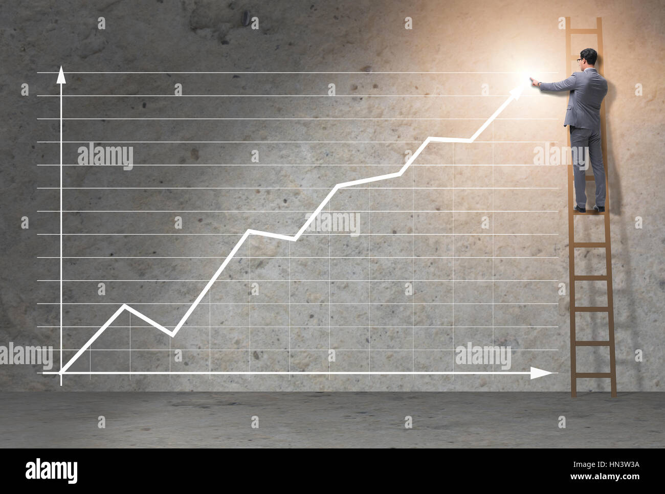 Young businessman facilitating economic growth concept Stock Photo - Alamy