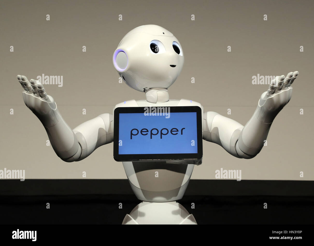 Tokyo, Japan. 7th Feb, 2017. Softbank's humanoid robot Pepper delivers ...
