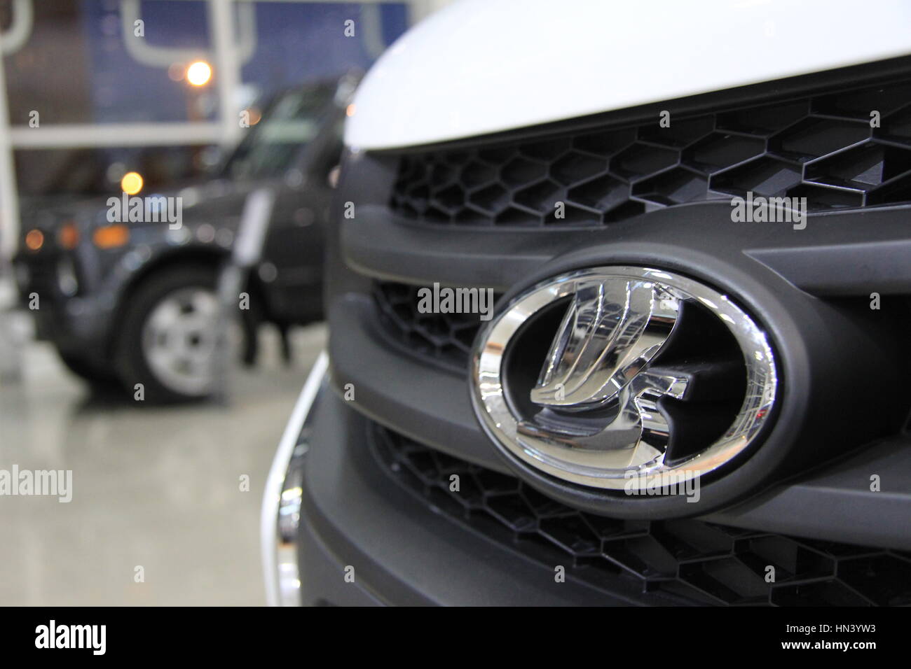 The Lada logo on the radiator grill of a car assembled in the Russian ...