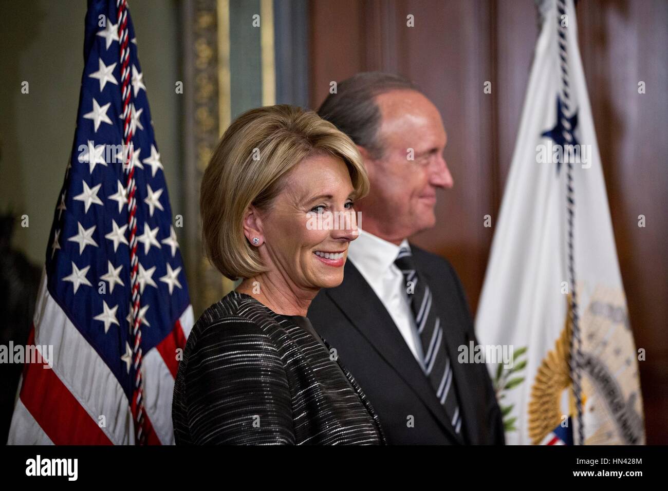 Betsy DeVos, United States Secretary of Education, stands with her ...