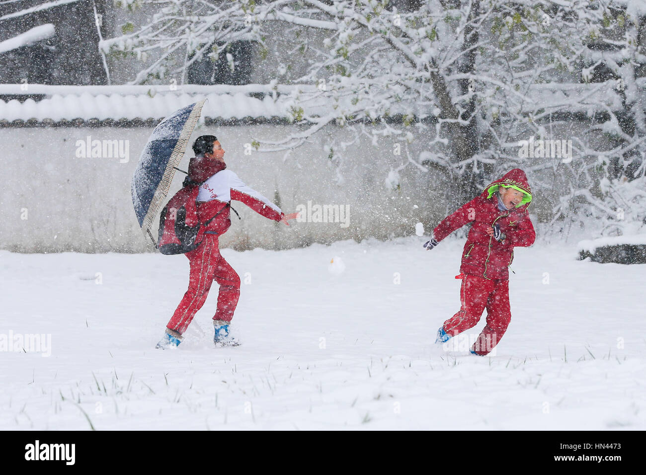 Huai'an, China's Jiangsu Province. 8th Feb, 2017. Two children play in ...