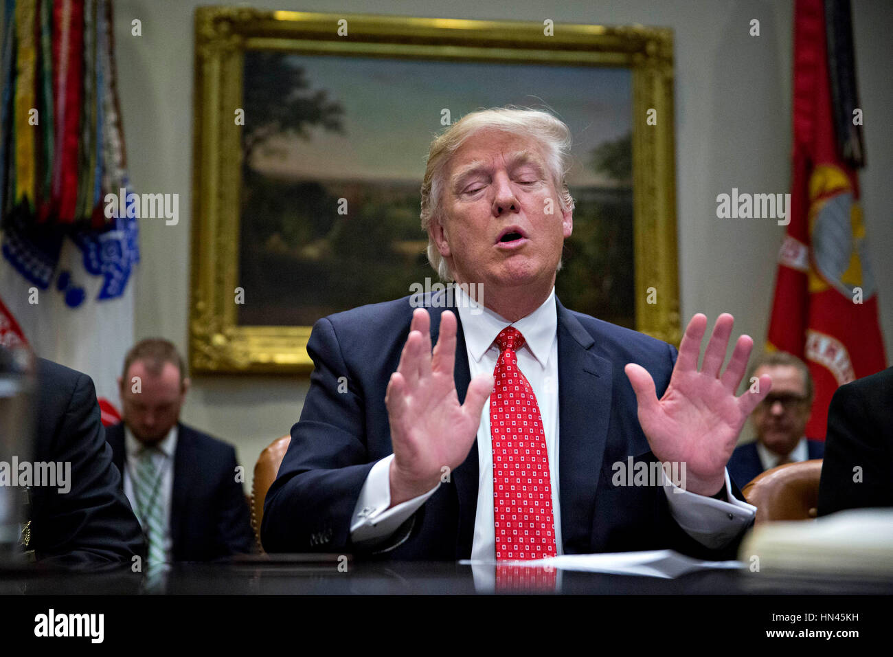 U.S. President Donald Trump speaks as he meets with county sheriffs ...