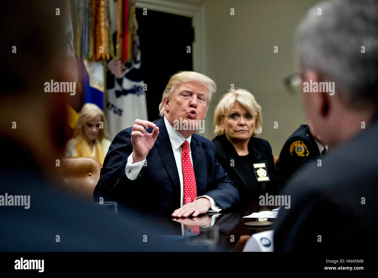 U.S. President Donald Trump speaks as he meets with county sheriffs ...