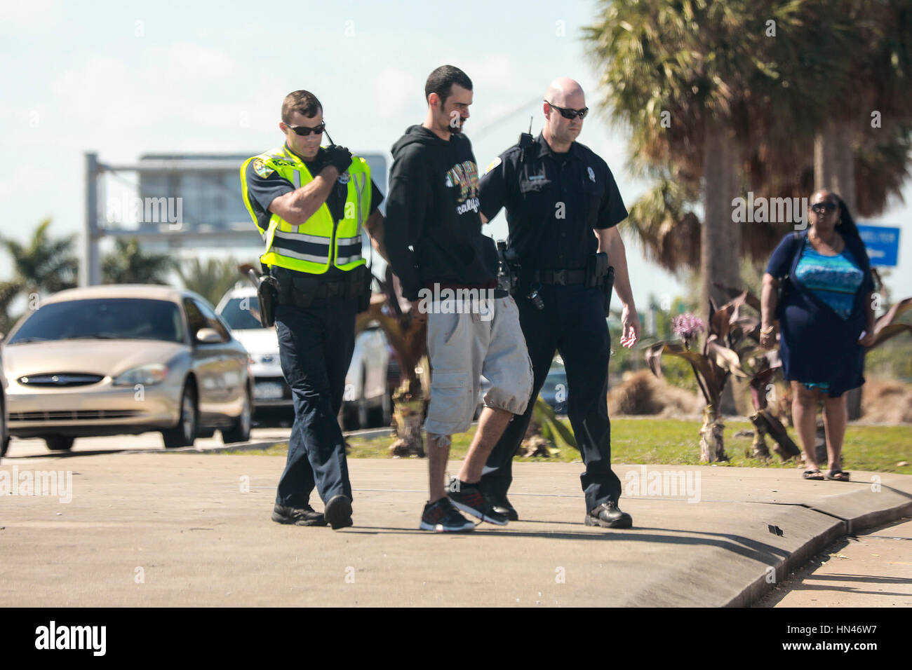 Florida, USA. 8th Feb, 2017. Boynton Beach police take a man into ...