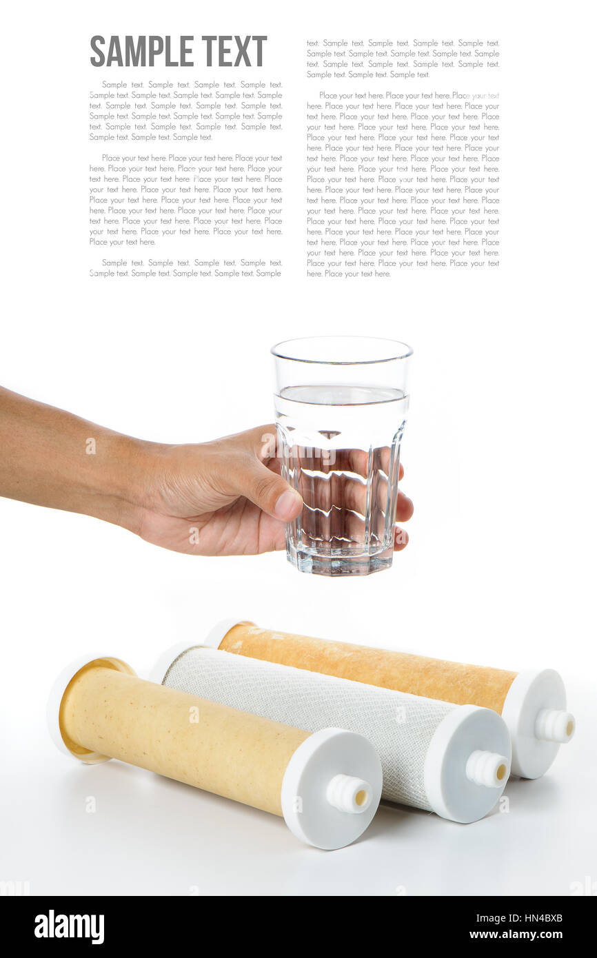 a glass of water in hand with water filter Stock Photo - Alamy