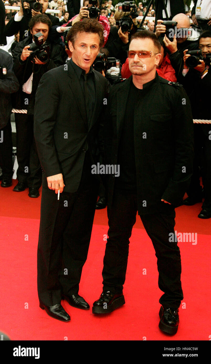 Bono, right, and Sean Penn arrives at the Un Conte De Noel premiere at ...