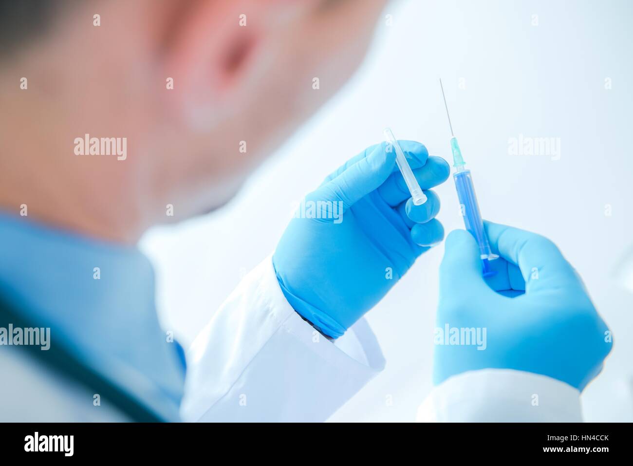 Syringe Injection by Doctor. Medical Doctor Preparing For Injection ...