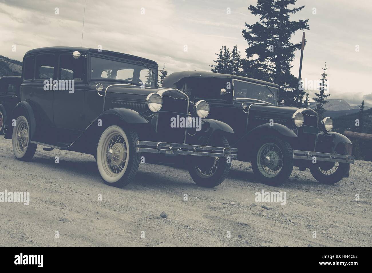 Two Vintage Cars Old Timers on the Mountain Road Stock Photo - Alamy
