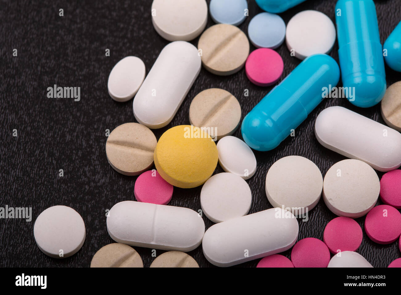 different tablets pills capsule heap mix therapy drugs Stock Photo - Alamy