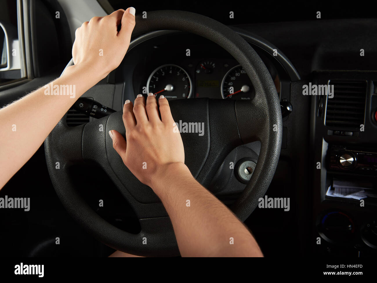 driver hands using horn isolated on black Stock Photo - Alamy