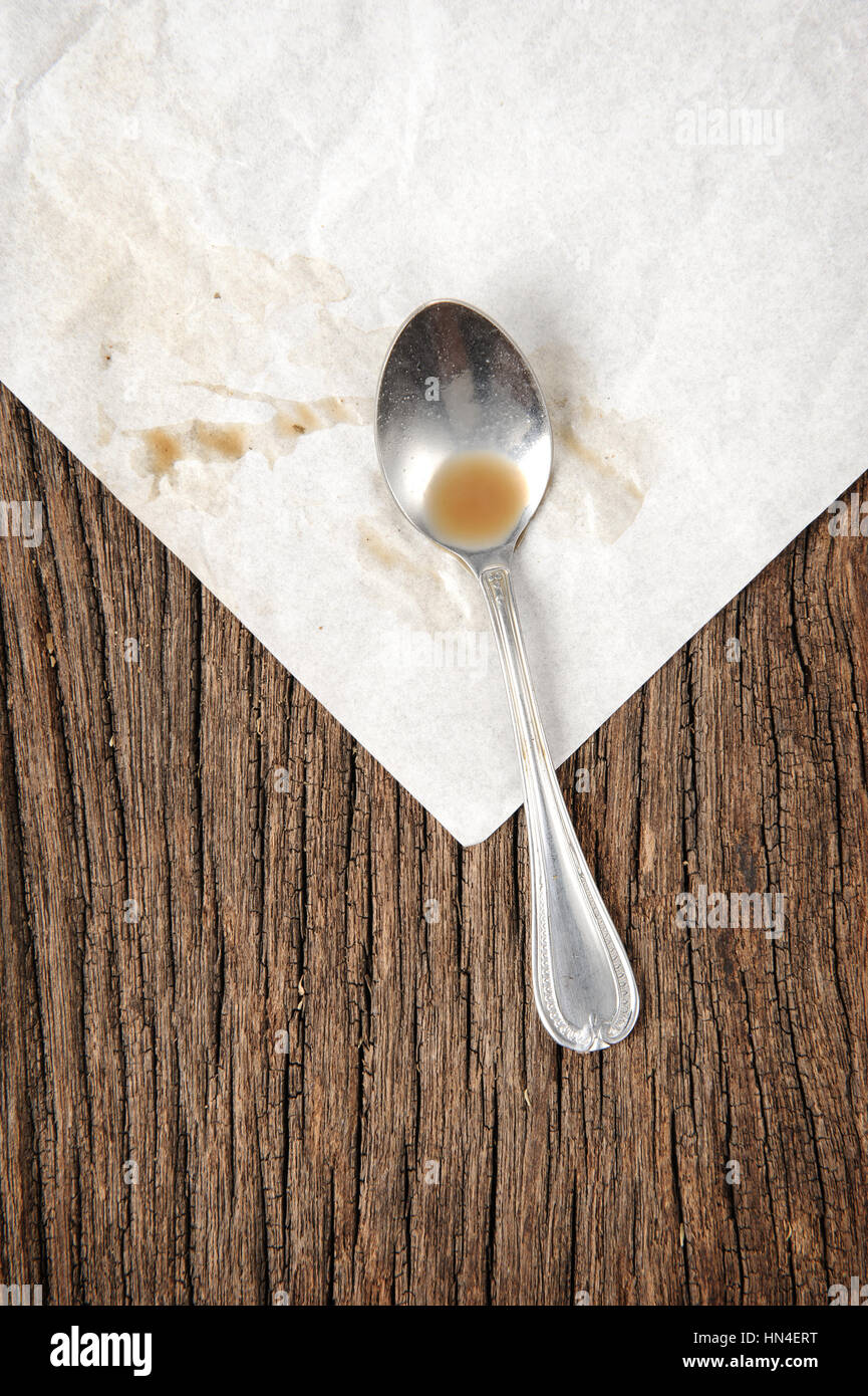 closeup teaspoon on folded paper Stock Photo - Alamy