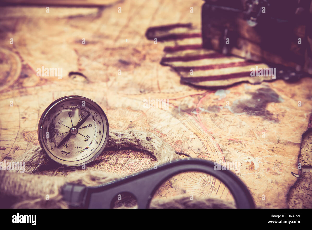 Columbus day and world map with compass Stock Photo - Alamy