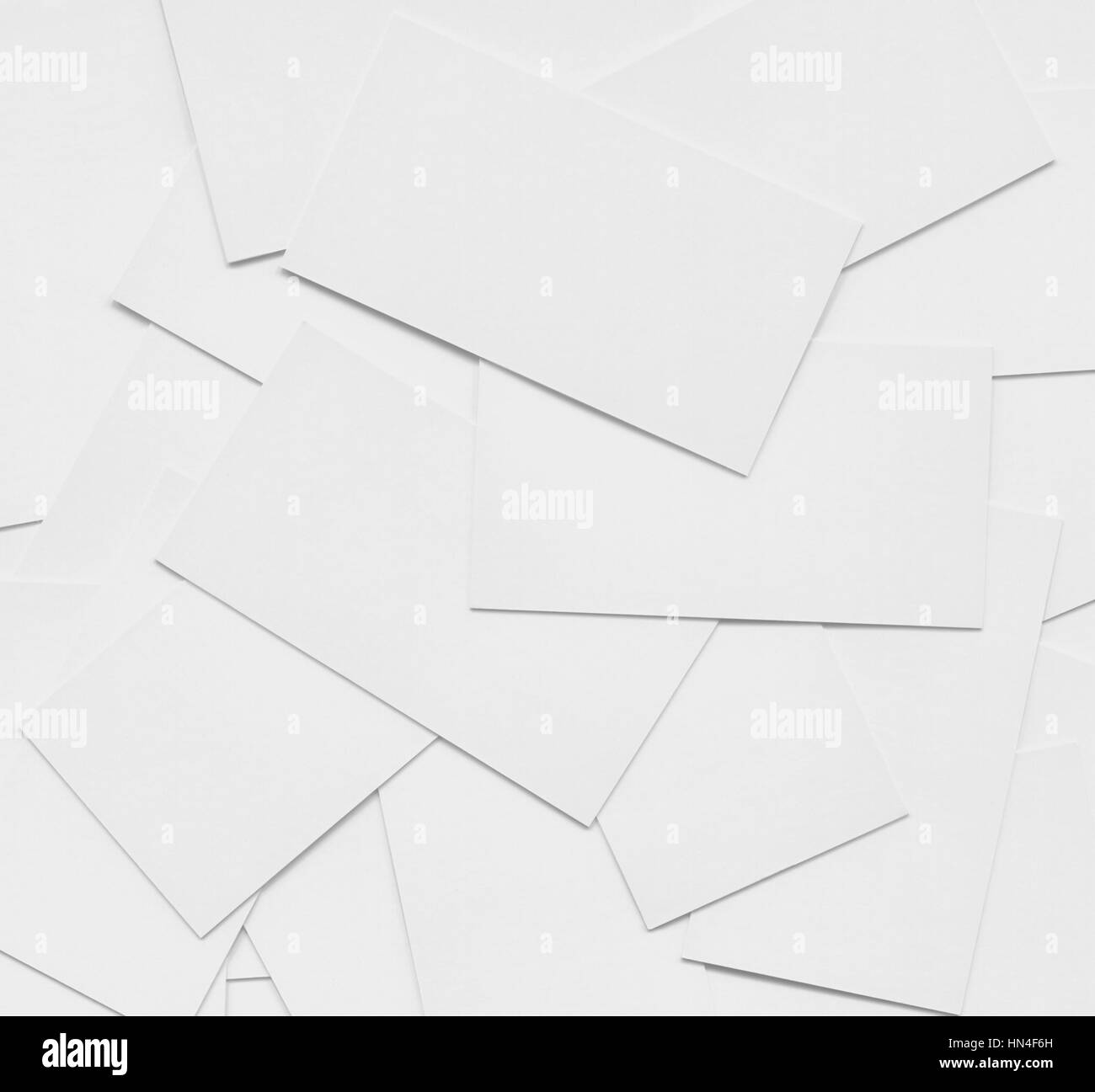 Multiple blank business cards background, detailed white empty pattern ...