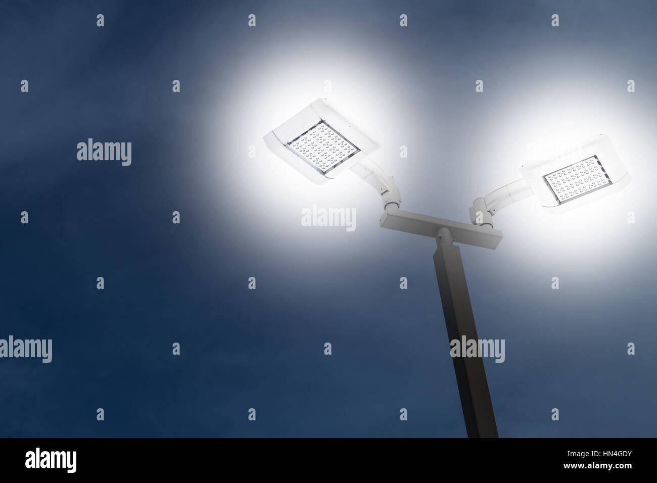 LED outdoor car park flood light working on night, saving energy Stock ...