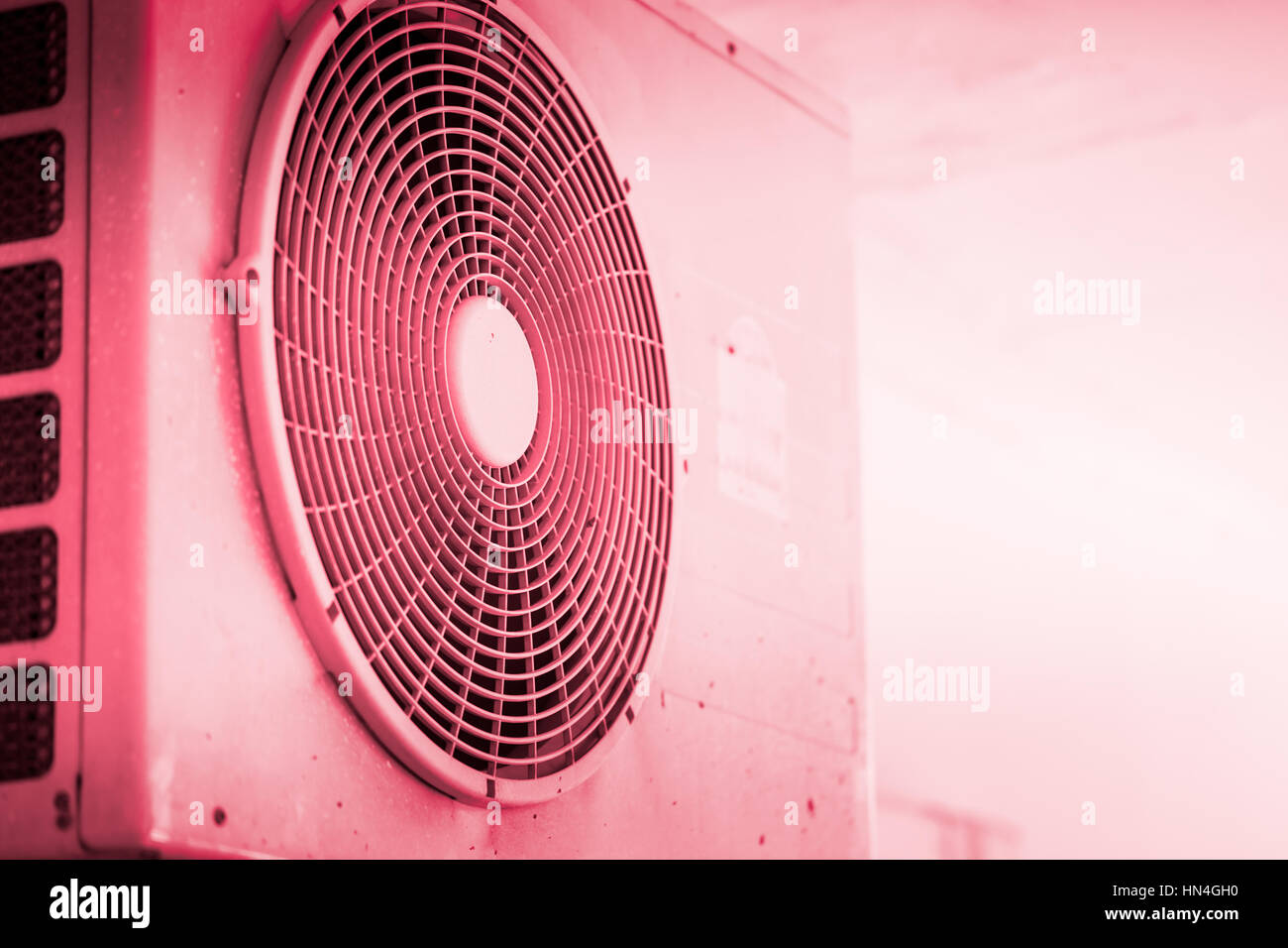 air condition compressor with red color tone Stock Photo - Alamy