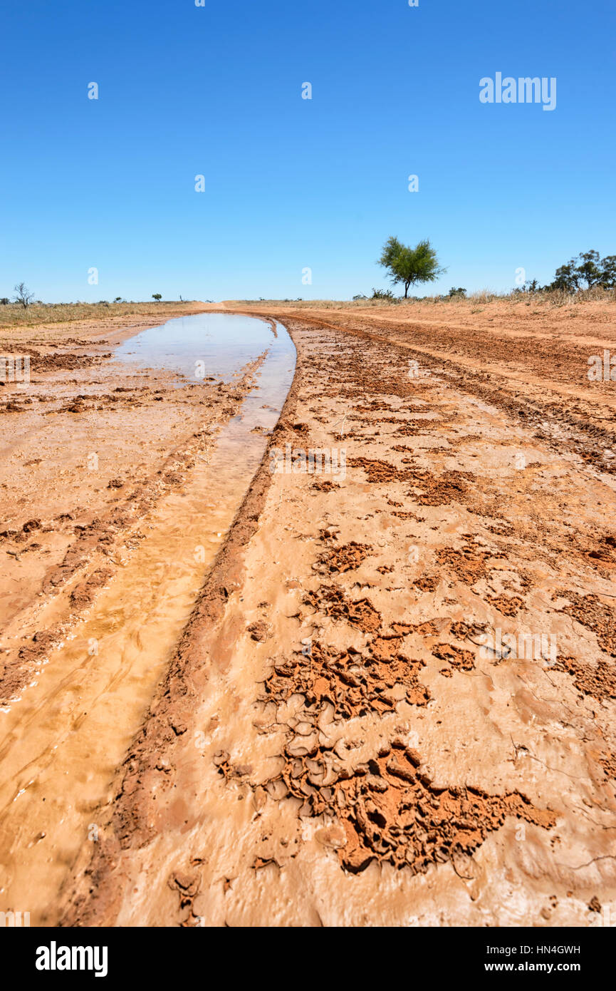 Flooded Outback dirt road between Pooncarie and Menindee, New South ...