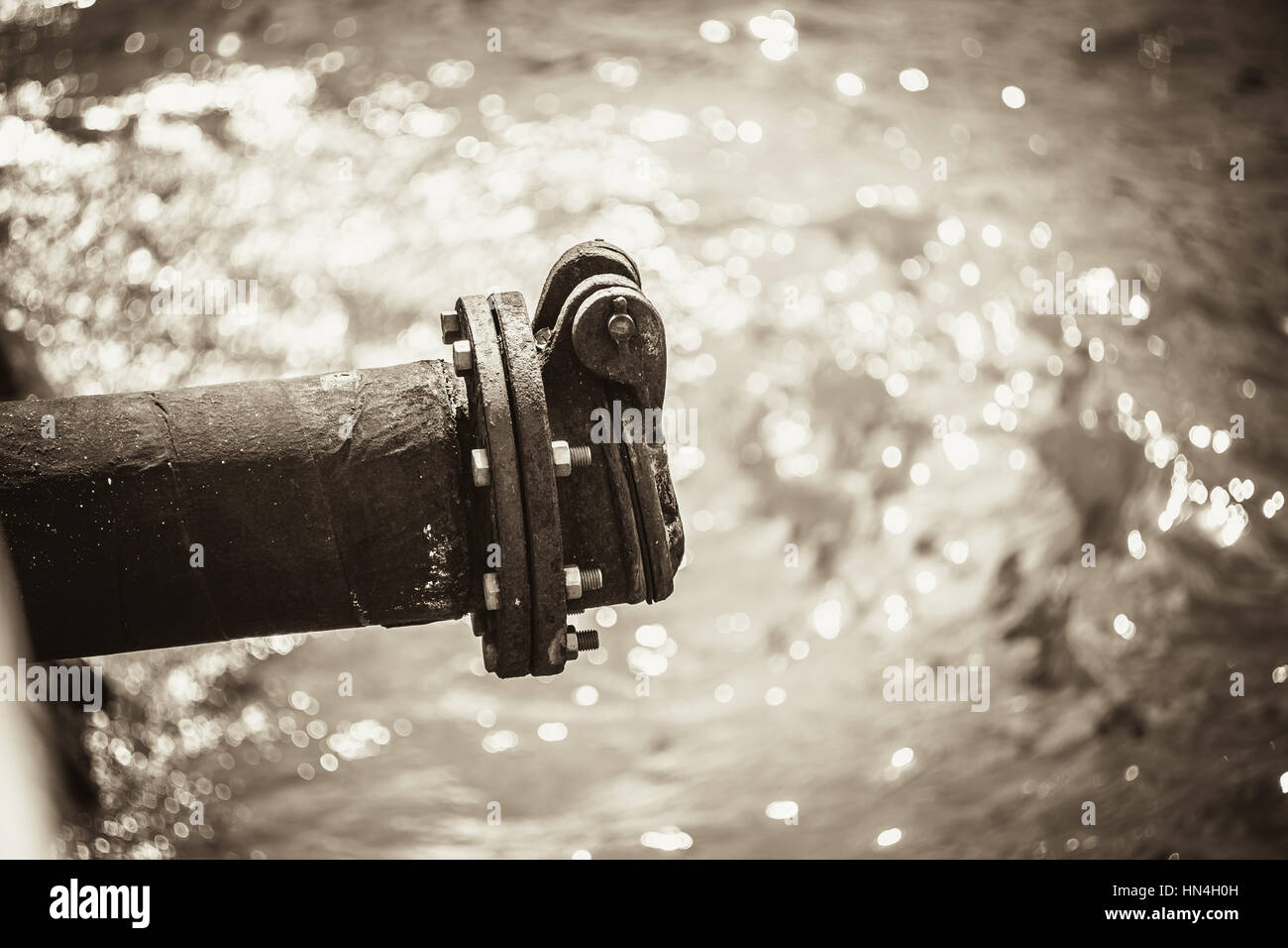 dirty waste water pipe out to the river or Sewer drain pipe monotone ...