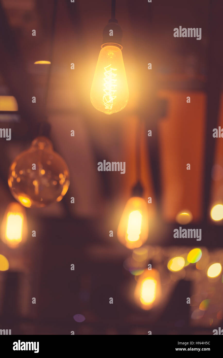 hanging retro light bulb in the cafe or coffee shop interior design ...