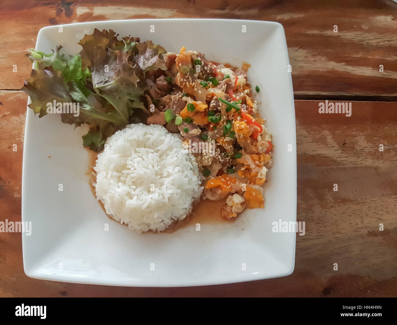 Close-up,Thai food style:"Kaow Moo Tun Pad Thai"fied pork,egg and ...