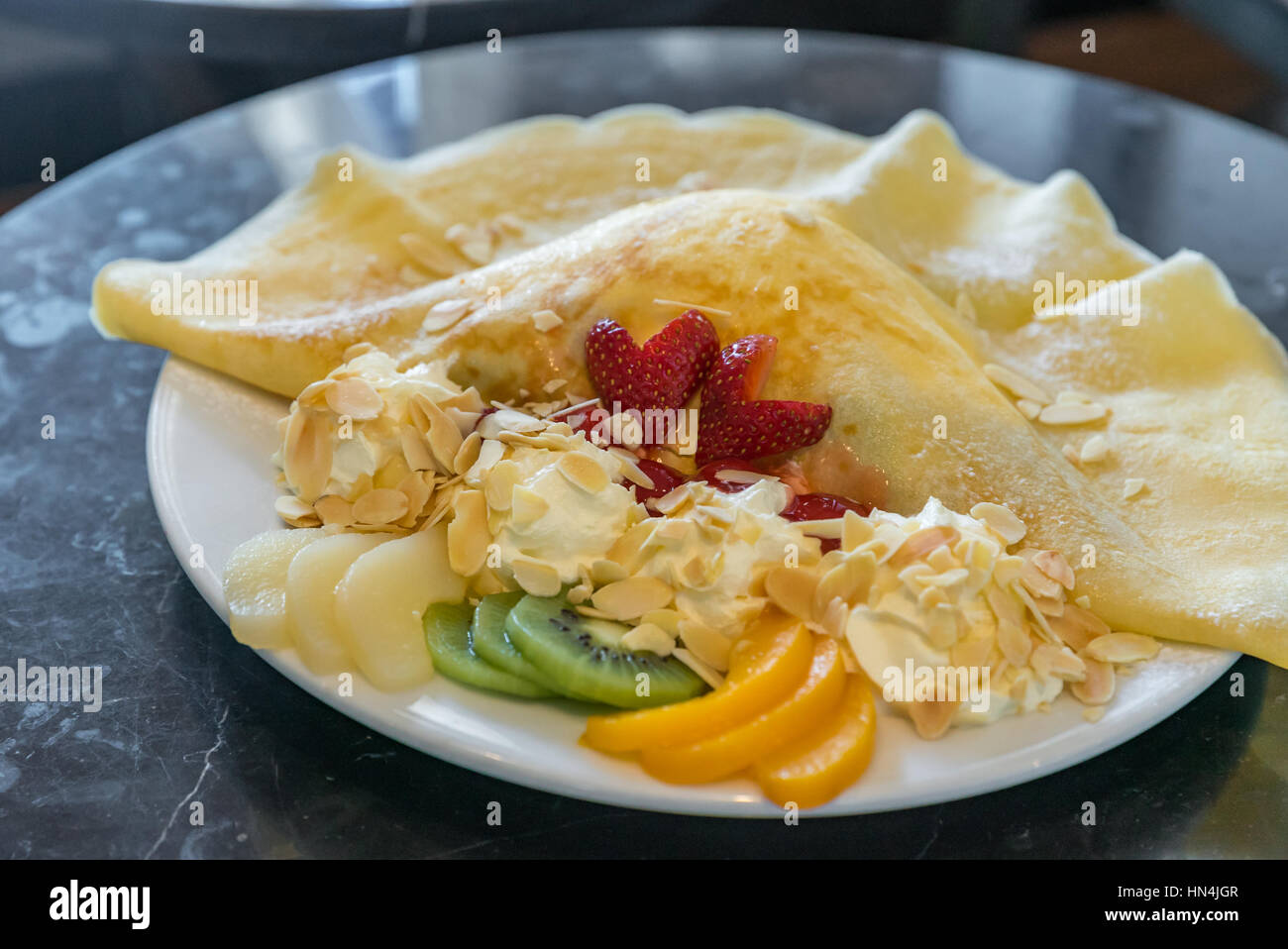 Exotic Fruit crape with ice cream Stock Photo - Alamy