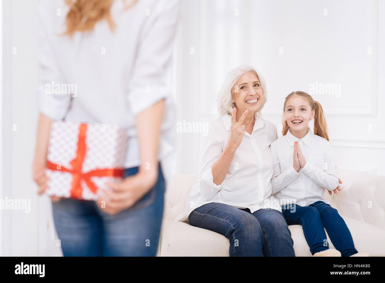 Positive family having celebration Stock Photo - Alamy