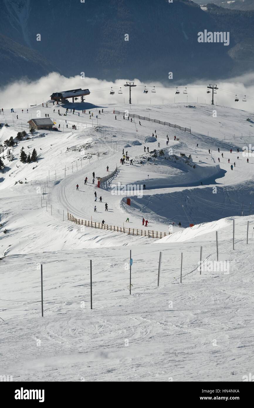 Skiers descend from forest hi-res stock photography and images - Alamy