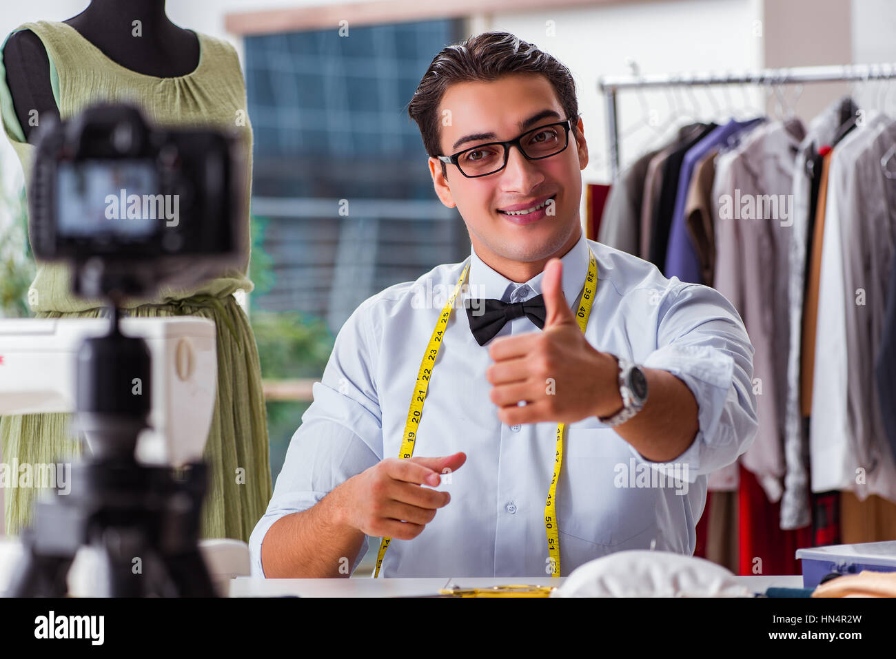 Young man working as fashion video blogger Stock Photo - Alamy