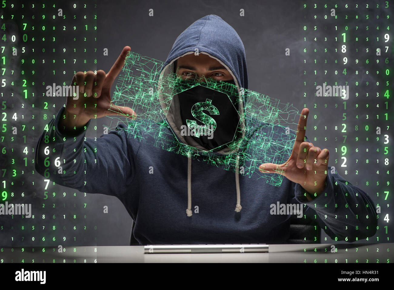 Hacker stealing dollars from bank Stock Photo - Alamy