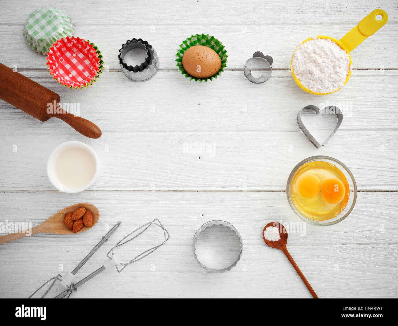 Baking background with ingredients and baking utensils on white wooden ...