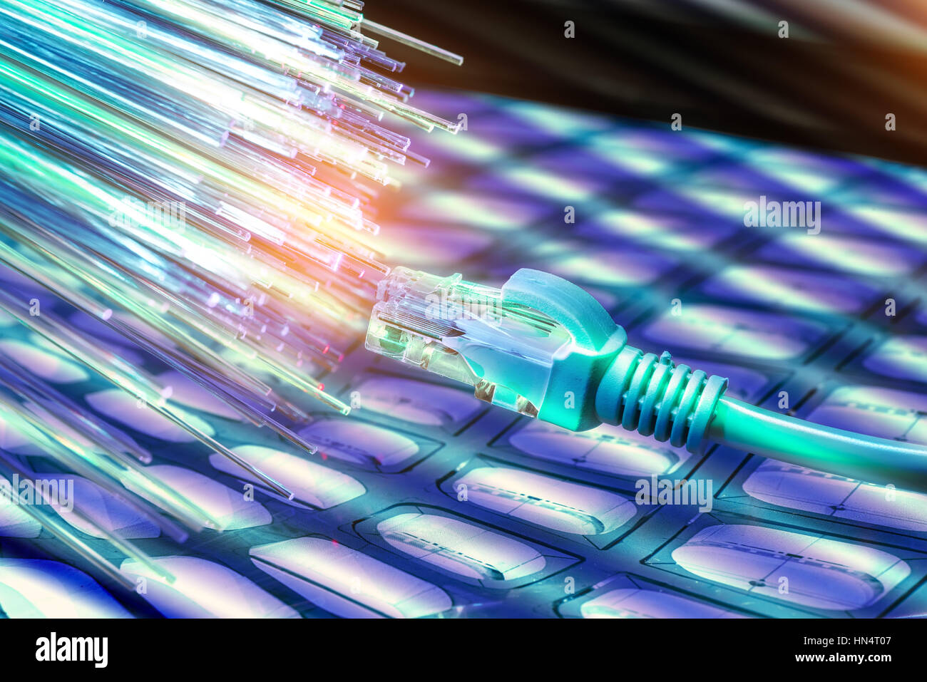 network cable with high tech technology color background Stock Photo ...