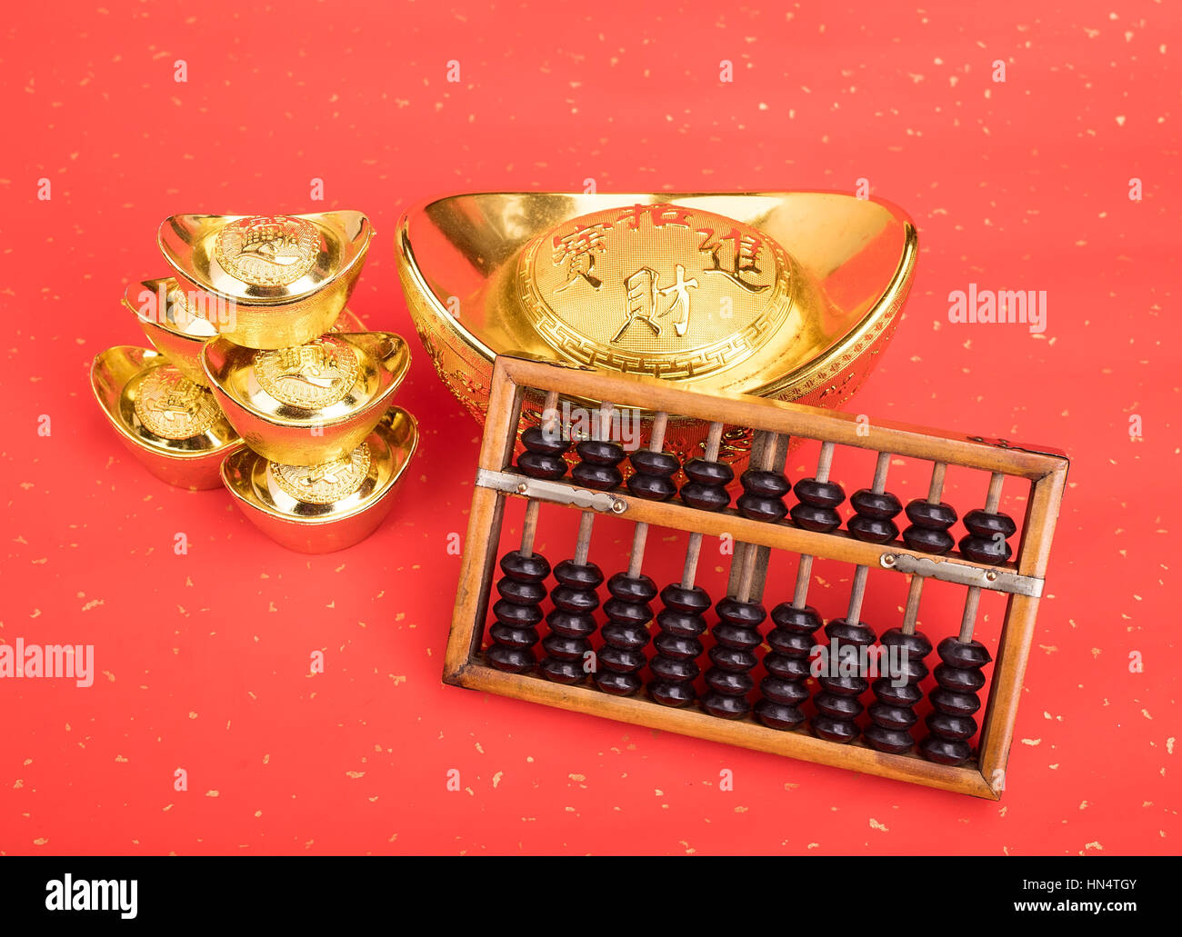 Chinese gold ingot and abacus mean symbols of wealth and prosperity ...